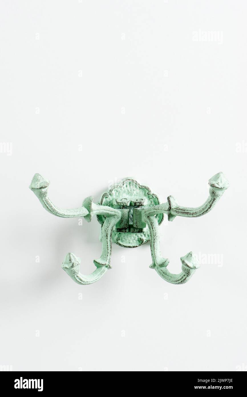 Hinged rustic coat hook Stock Photo - Alamy