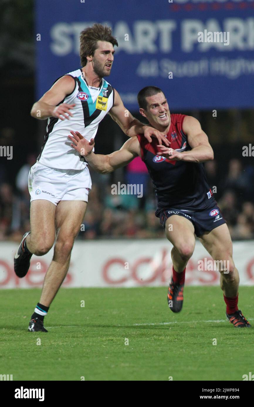James Magner holds out Justin Westhoff during the round 17 AFL match ...