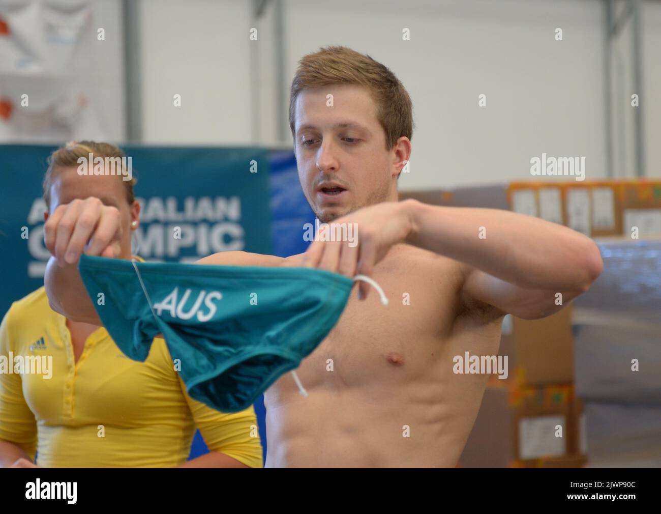 Australian Olympic swimmer Nick D'Arcy gets fitted with his clothing ...