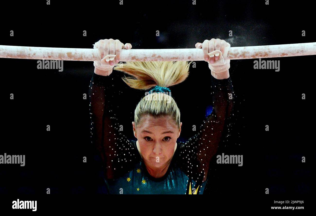 Australian gymnast Emily Little runs through her uneven bars routine ...