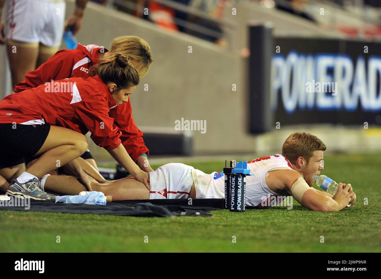 Sydney's Daniel Hannebery receives treatment during the Round 18 Gold ...