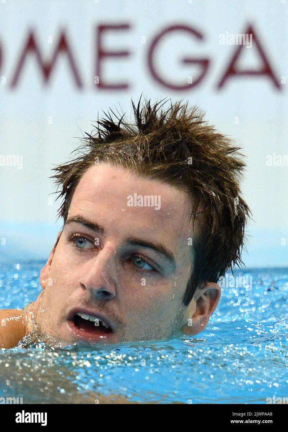 Australian swimmer James Magnussen looks on following the heats of the ...