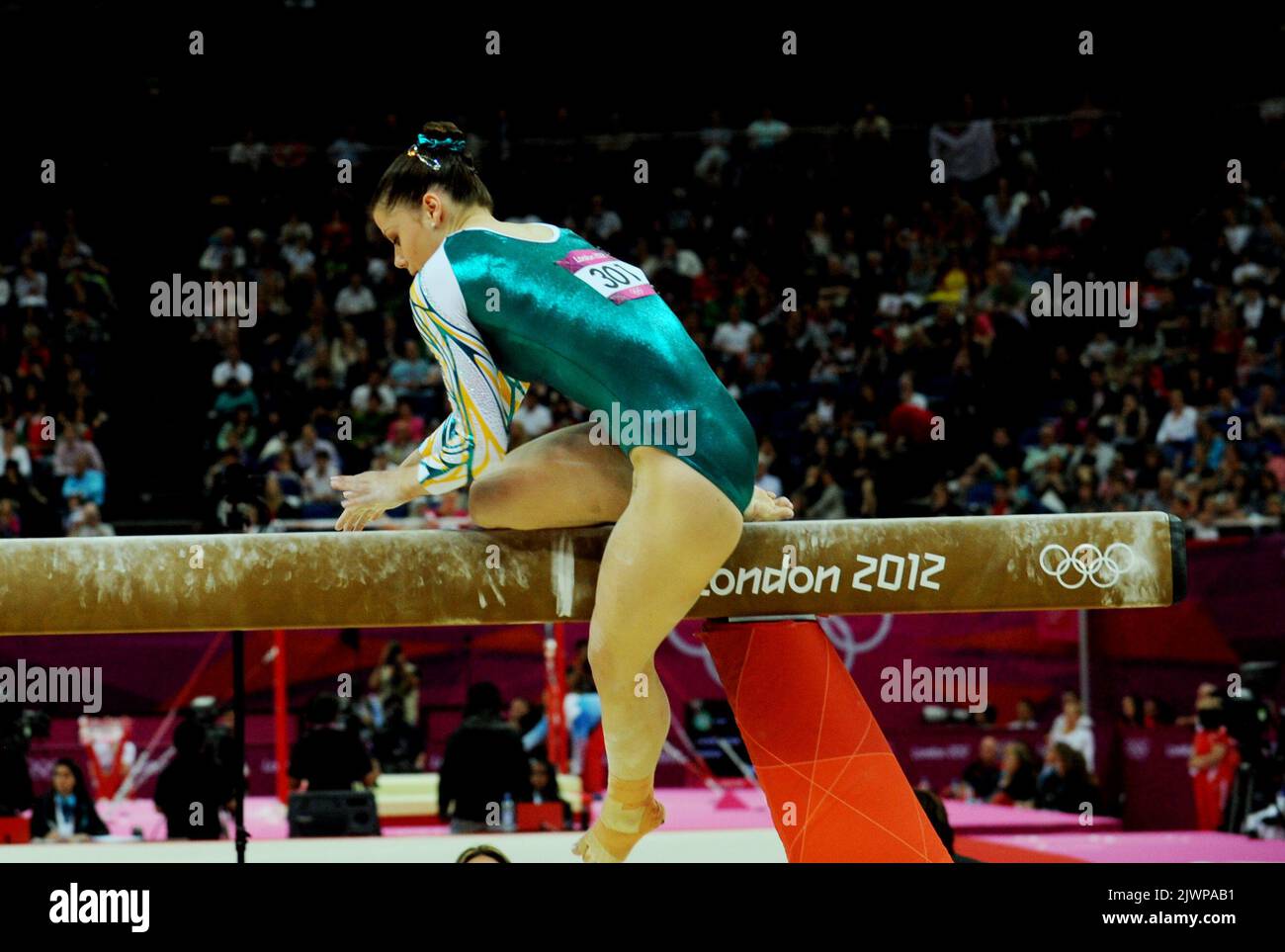 Australia's Georgia Bonora falls as she competes on the beam during the ...