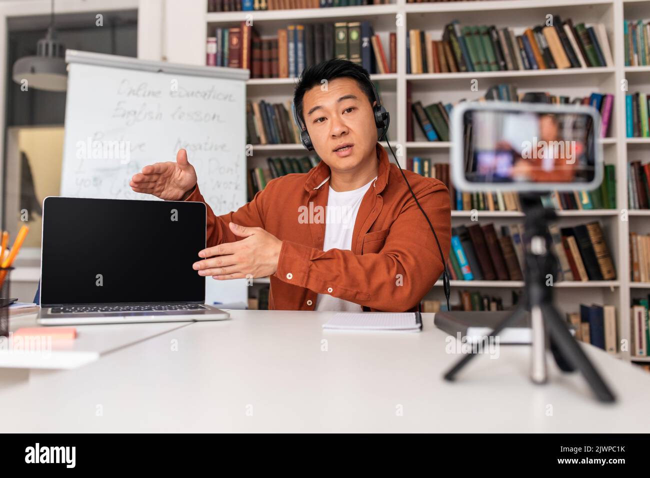 Korean Male Teacher Teaching Online Having Remote Lecture At Workplace ...