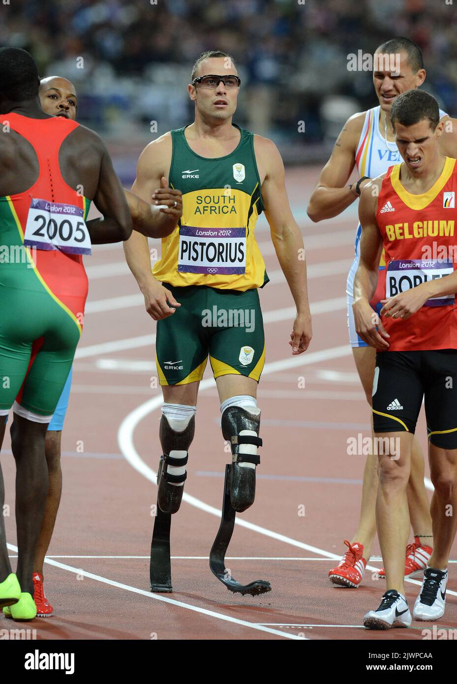 South African Oscar Pistorius, dubbed "Blade-Runner' (centre) looks on ...