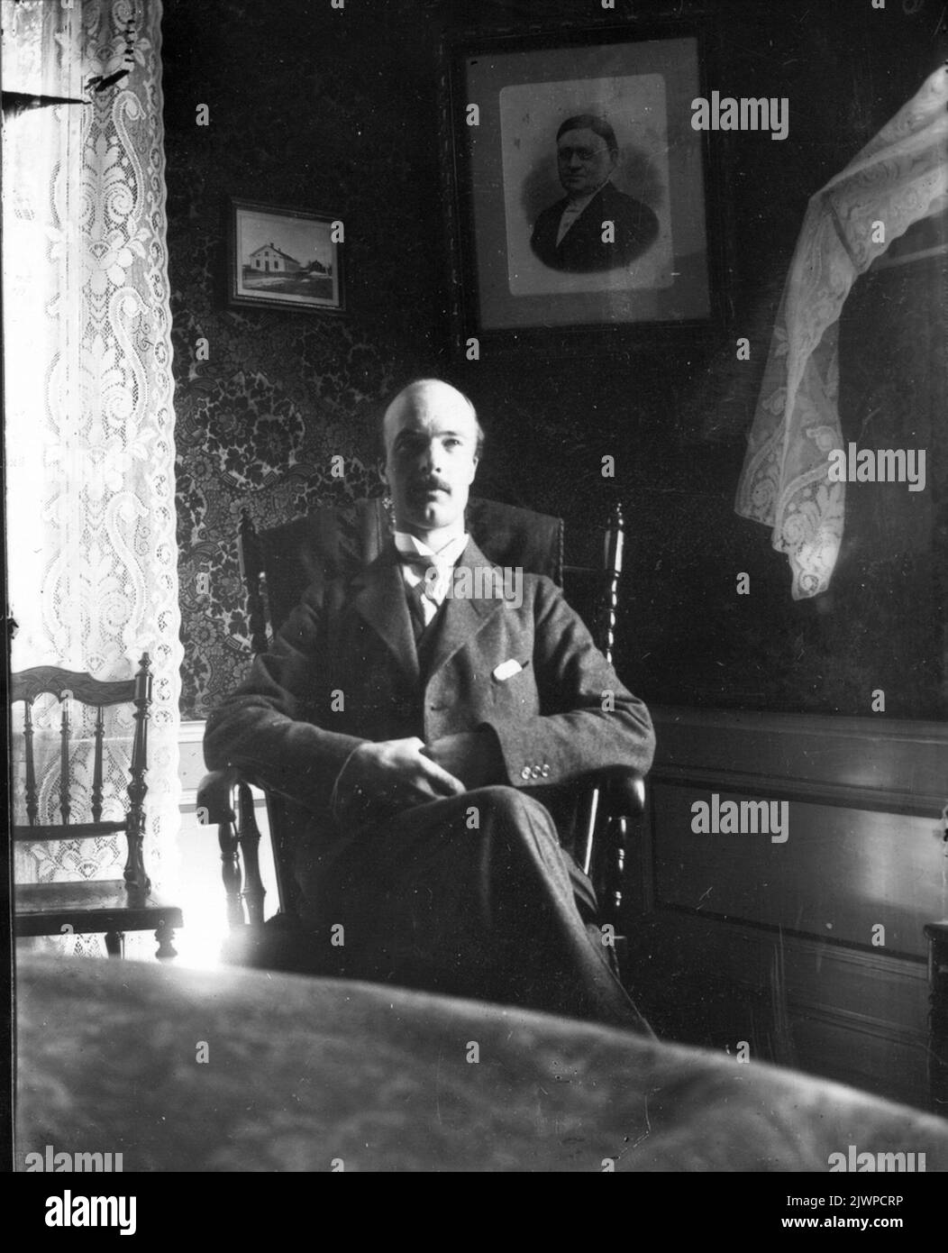 Man rocking chair Black and White Stock Photos & Images - Alamy
