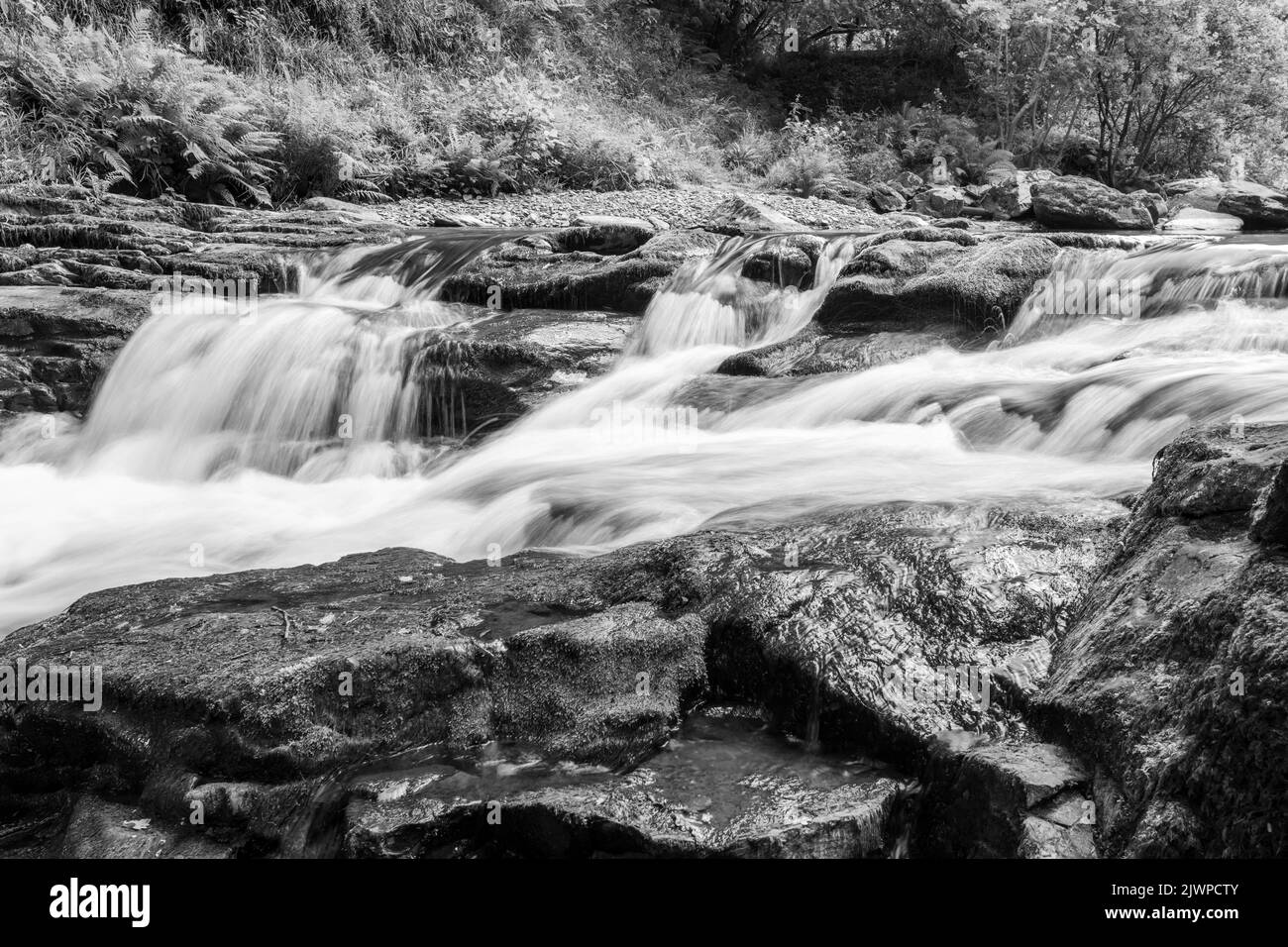 Long exposure of the Watersmeet Bridge waterfall on the East Lyn river ...