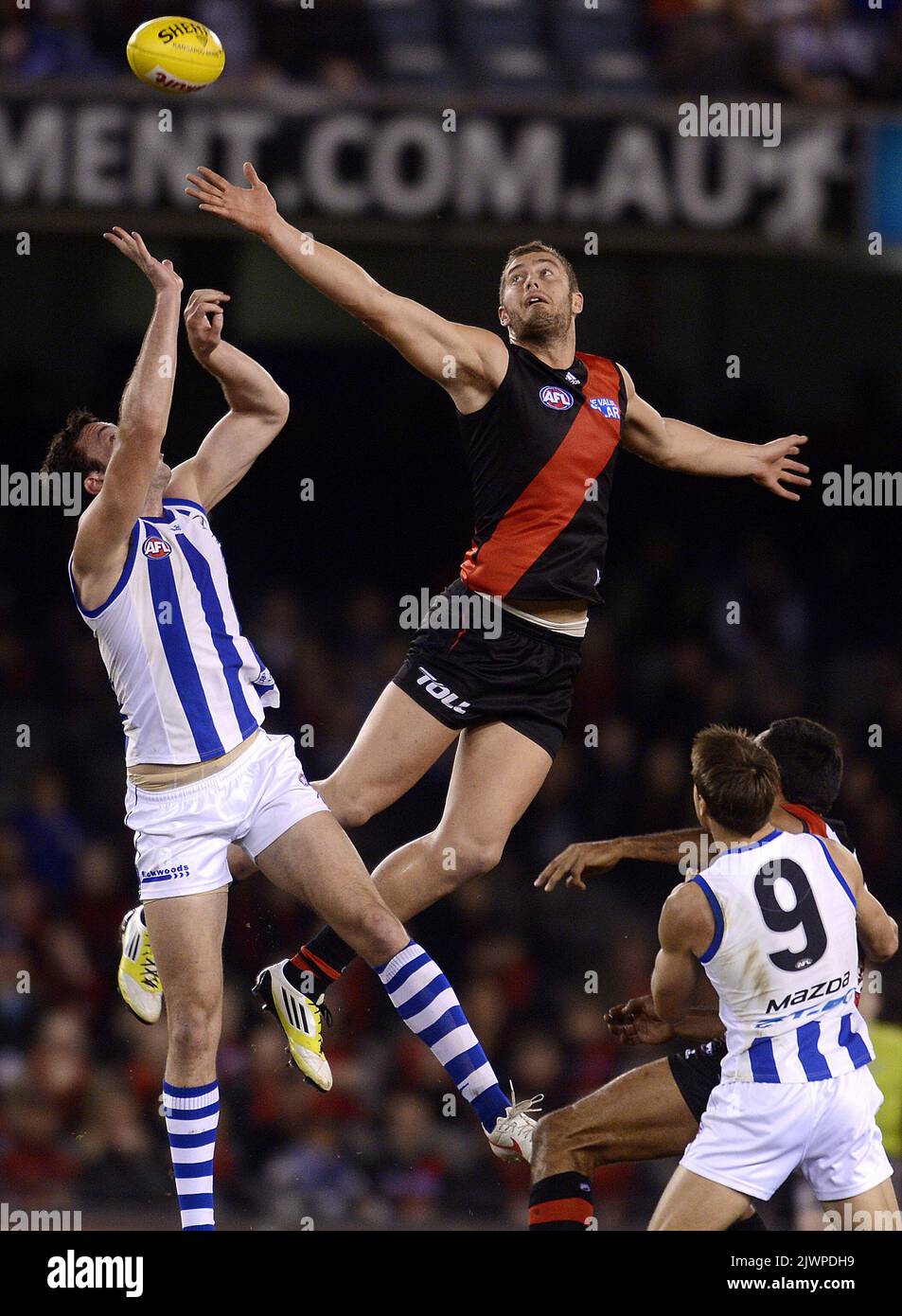 Tom Bellchambers of Essendon and Todd Goldstein of North Melbourne in ...
