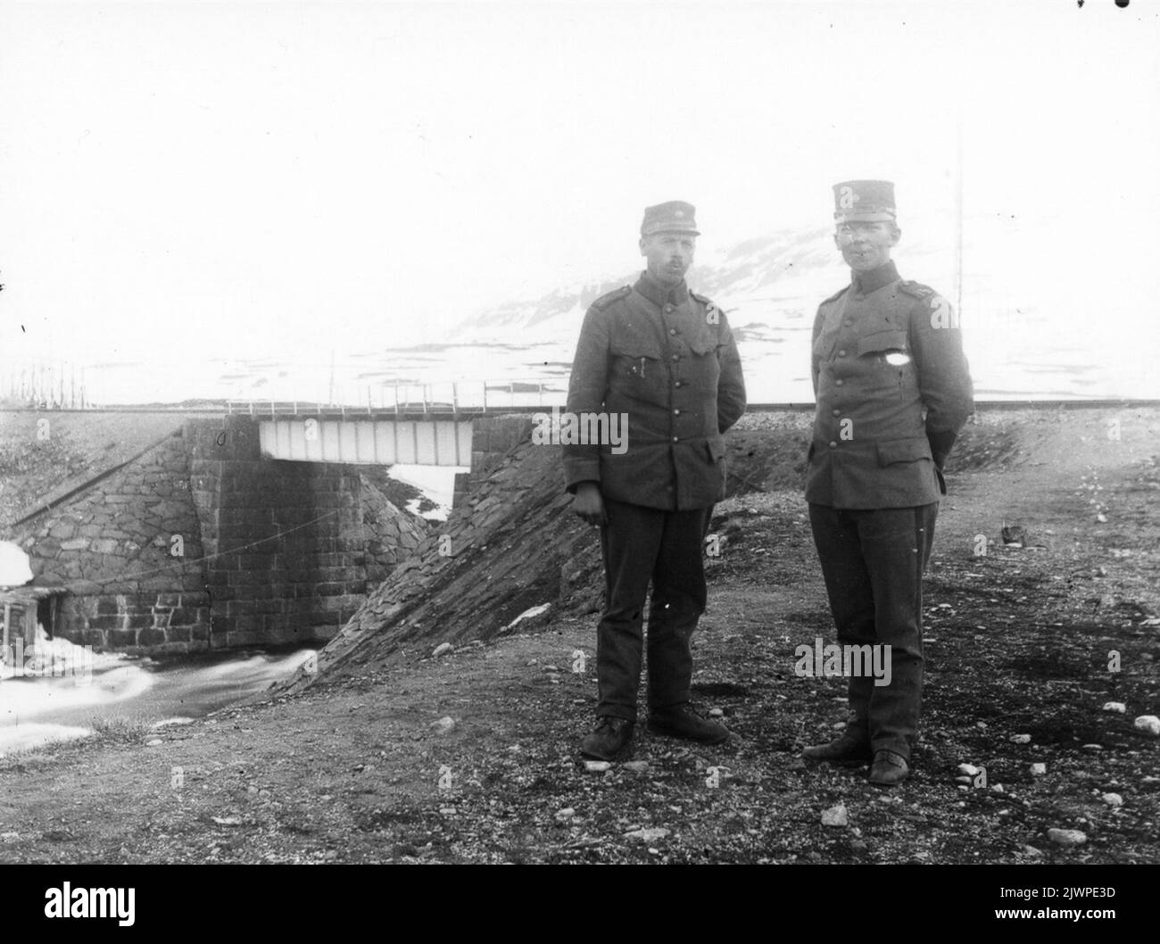 Two military guard a bridge. Två militärer vaktar en bro Stock Photo ...