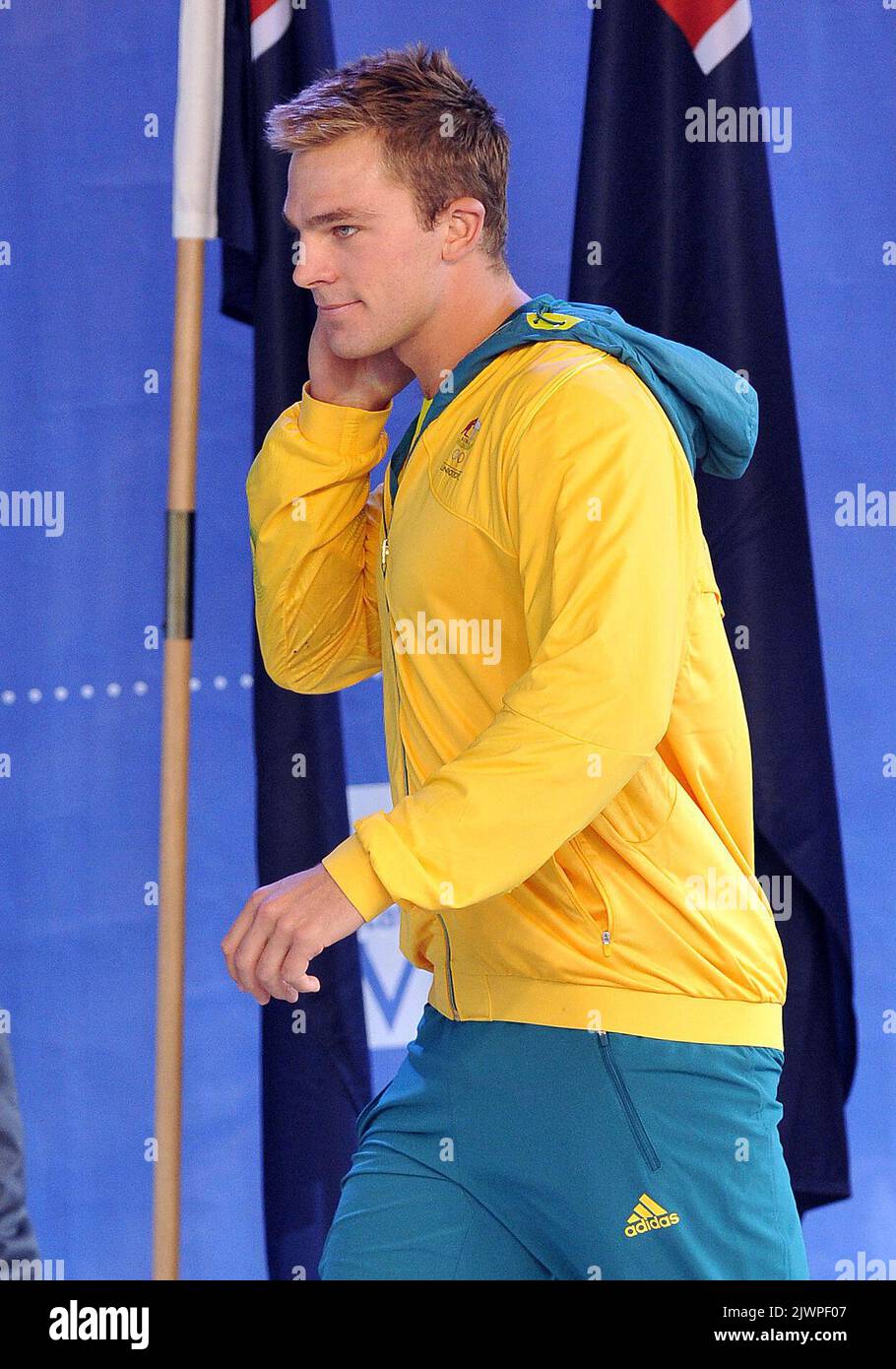 Disgraced rower Josh Booth makes his way across the stage at Federation ...