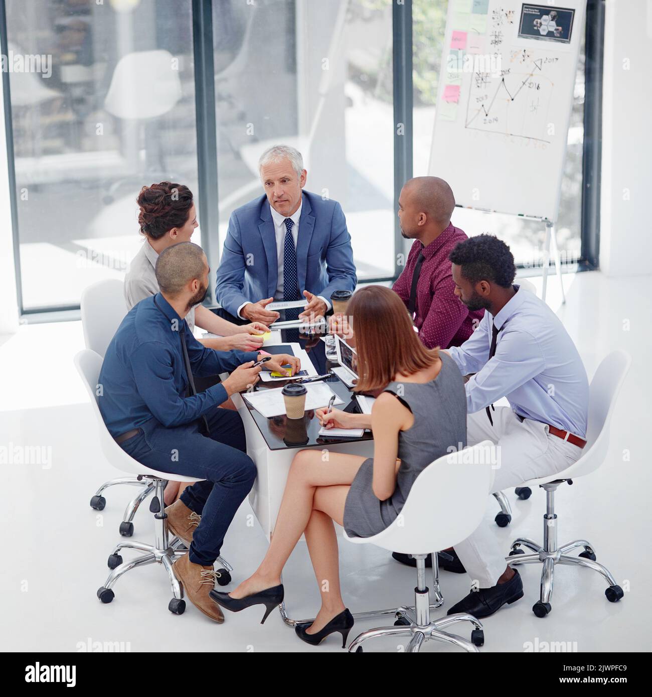 Success is a collaborative effort. a group of colleagues having a ...