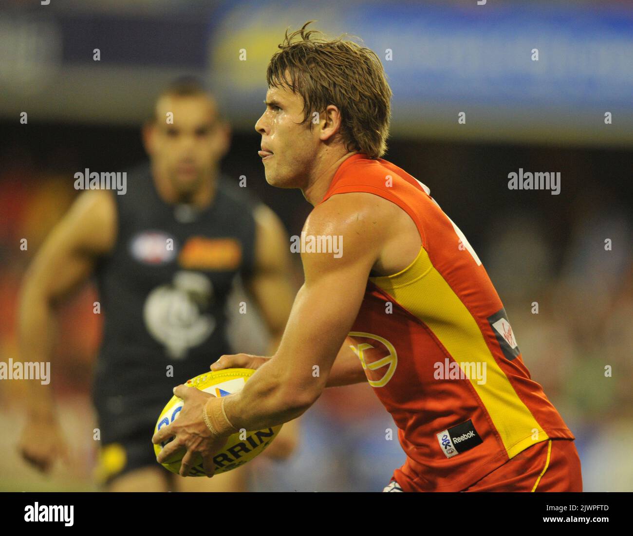 Gold Coast's Maverick Weller in action during their Round 22 Gold Coast ...