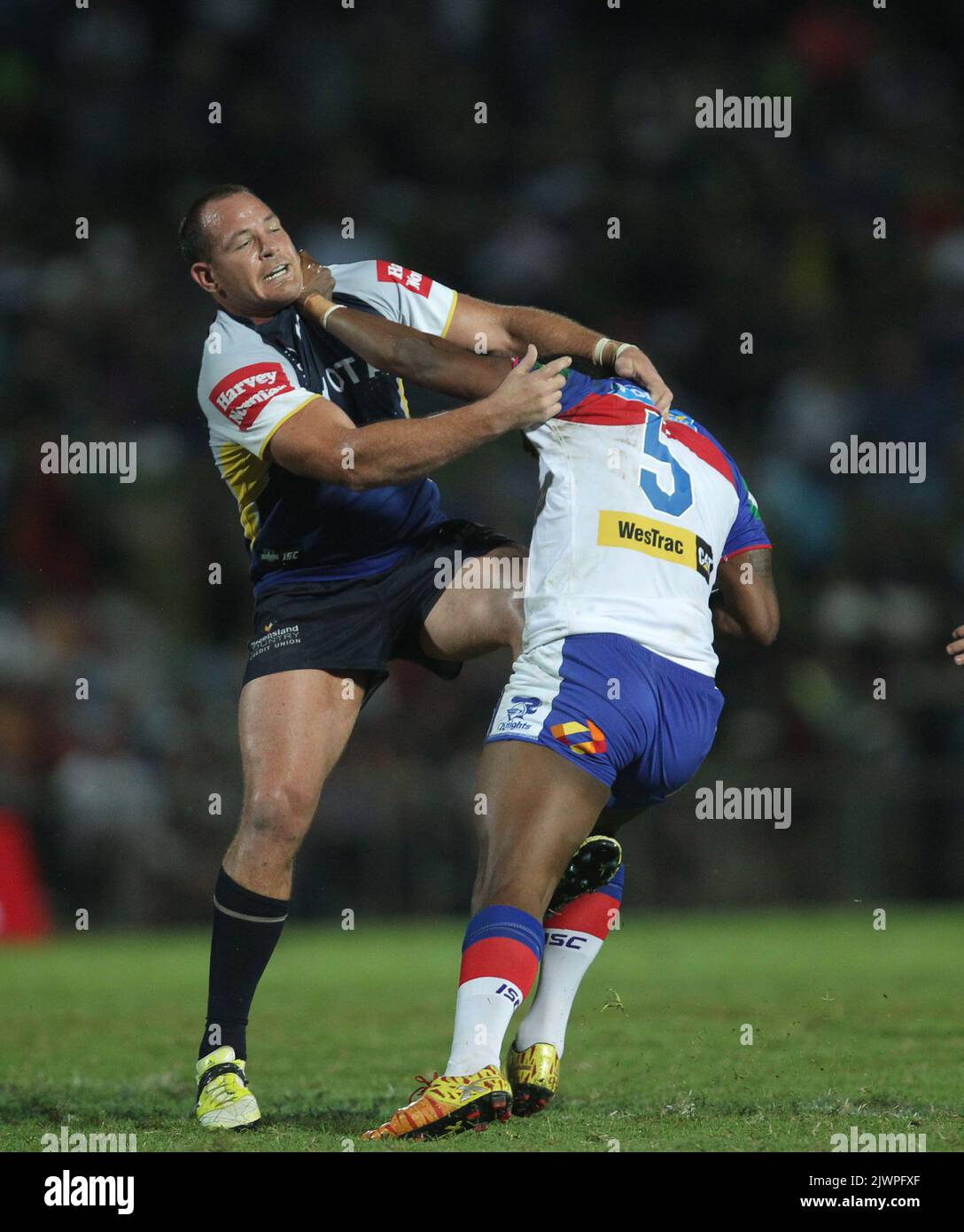 Matt Scott fended by Akuila Uate during the NRL Rugby League, Round 25 ...