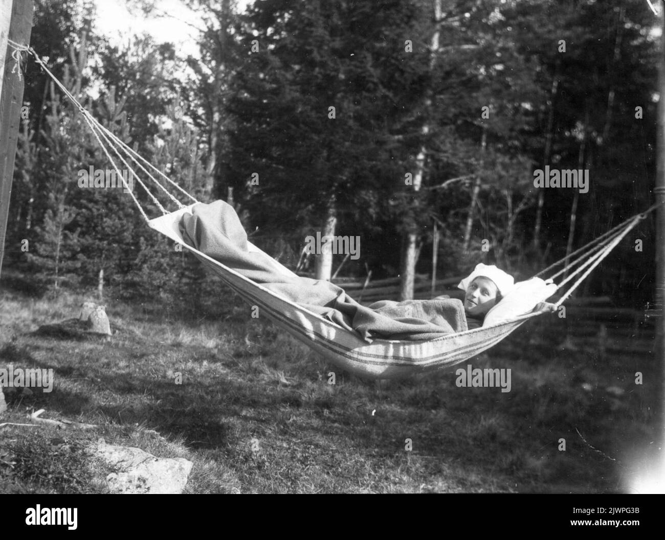 Girl in hammock.original text: Siesta in the hammock at Wittersjö ...