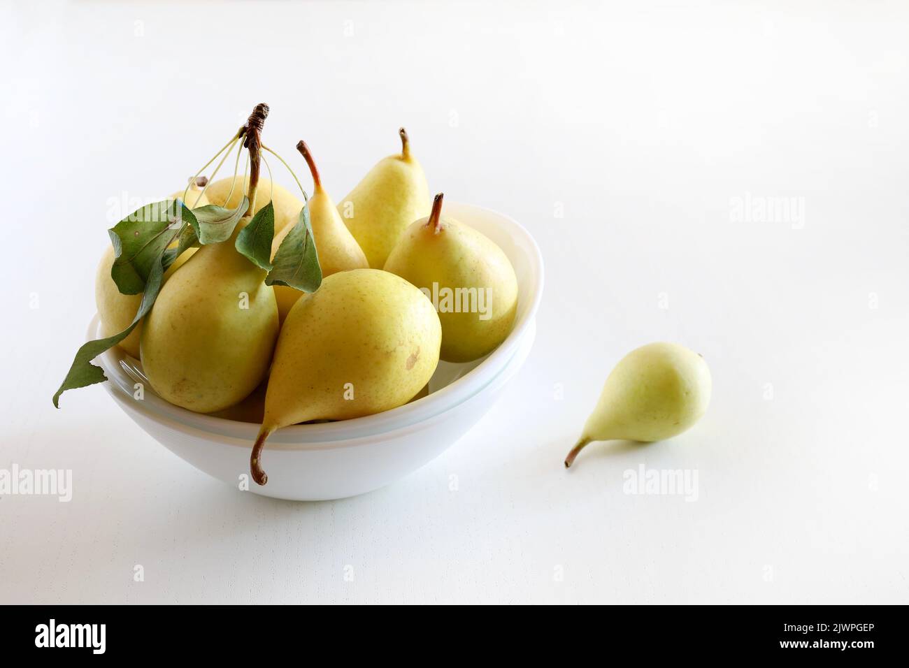 Group of pears on a white background. Healthy food. Vegetarian or vegan ...