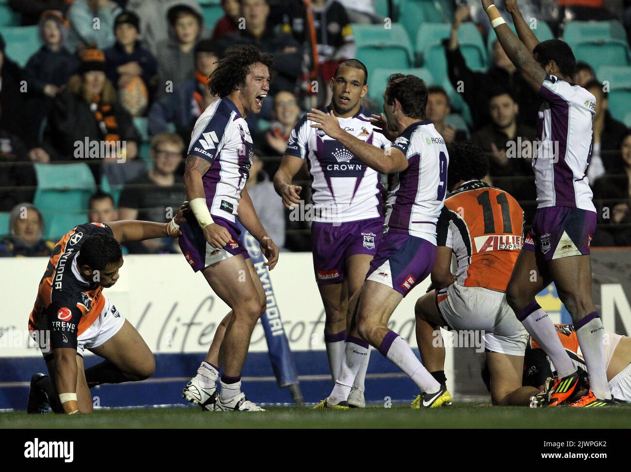 Kevin Proctor celebrates his try during the NRL Round 26 between Wests ...