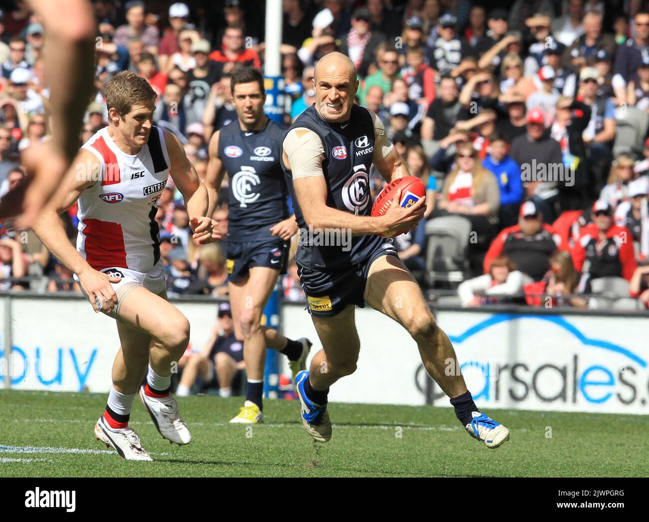 Chris Judd in action for Carlton in the round twenty three AFL game ...