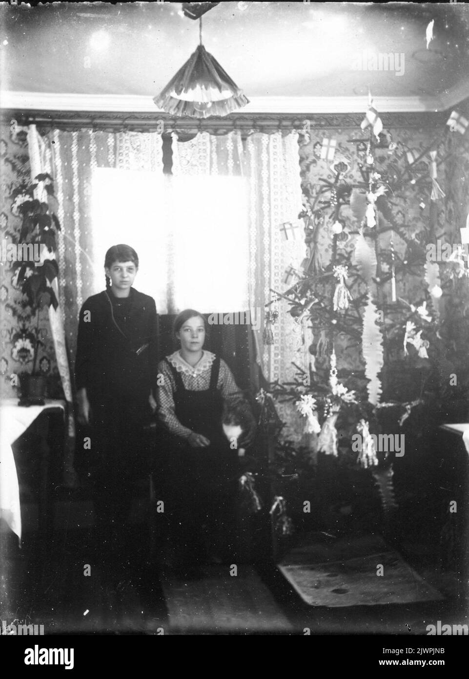 Christmas in "Forslunds", Östansjö. The girl in the armchair is Anna ...