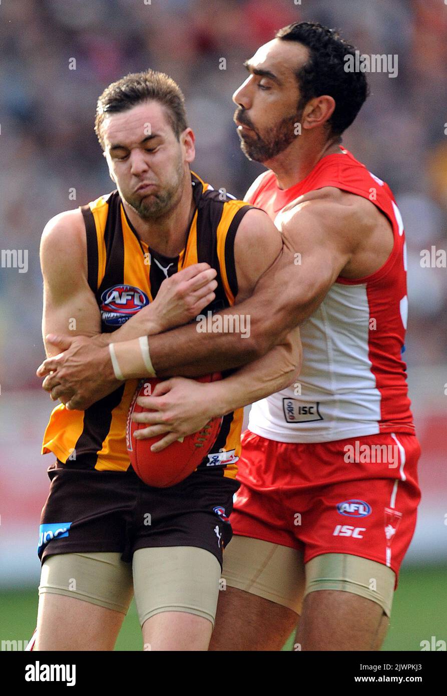Sydney's Adam Goodes tackles Matt Suckling of Hawthorn, in the 2012 AFL ...