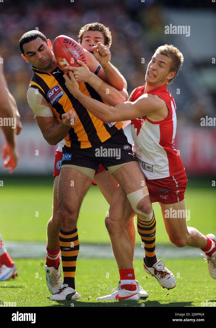 Kieren Jack of Sydney tackles Shaun Burgoyne of Hawthorn in the 2012 ...