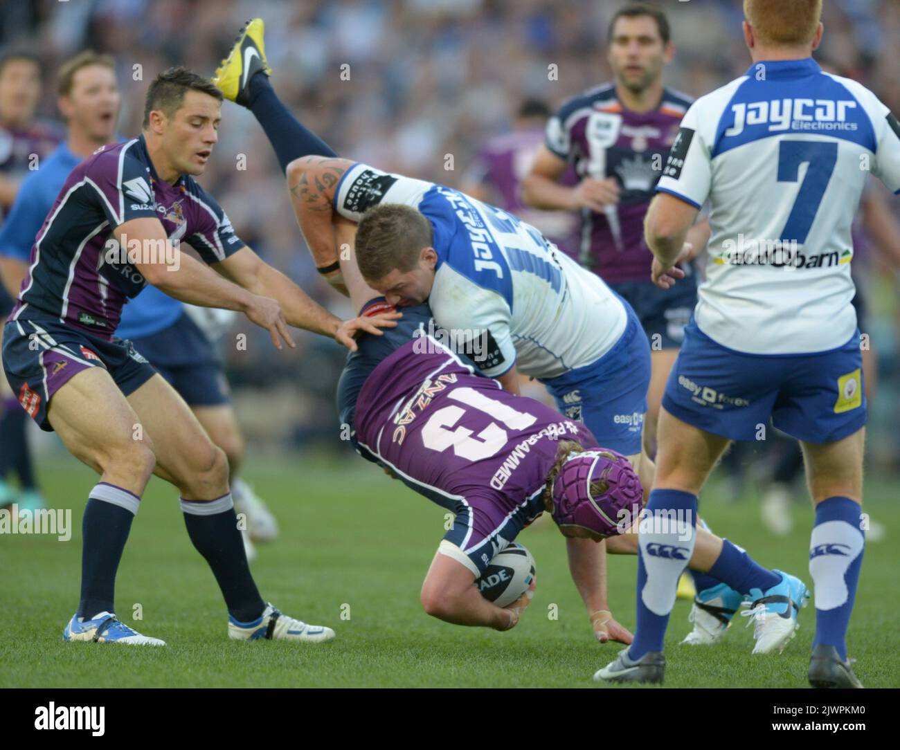 The Canterbury-Bankstown Bulldogs Greg Eastwood tackles the Melbourne ...