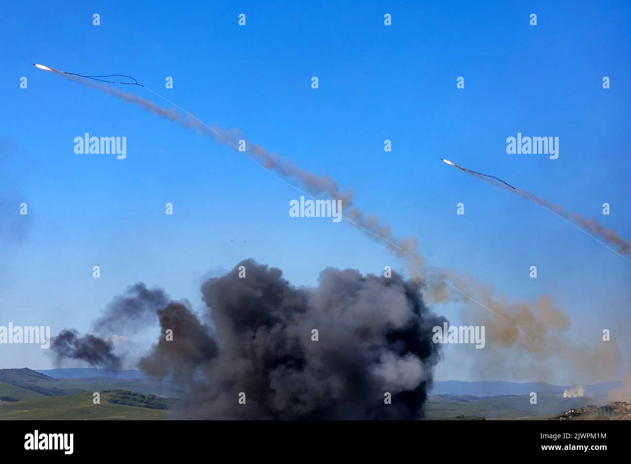 Russian self-propelled multiple rocket launchers fire projectiles ...