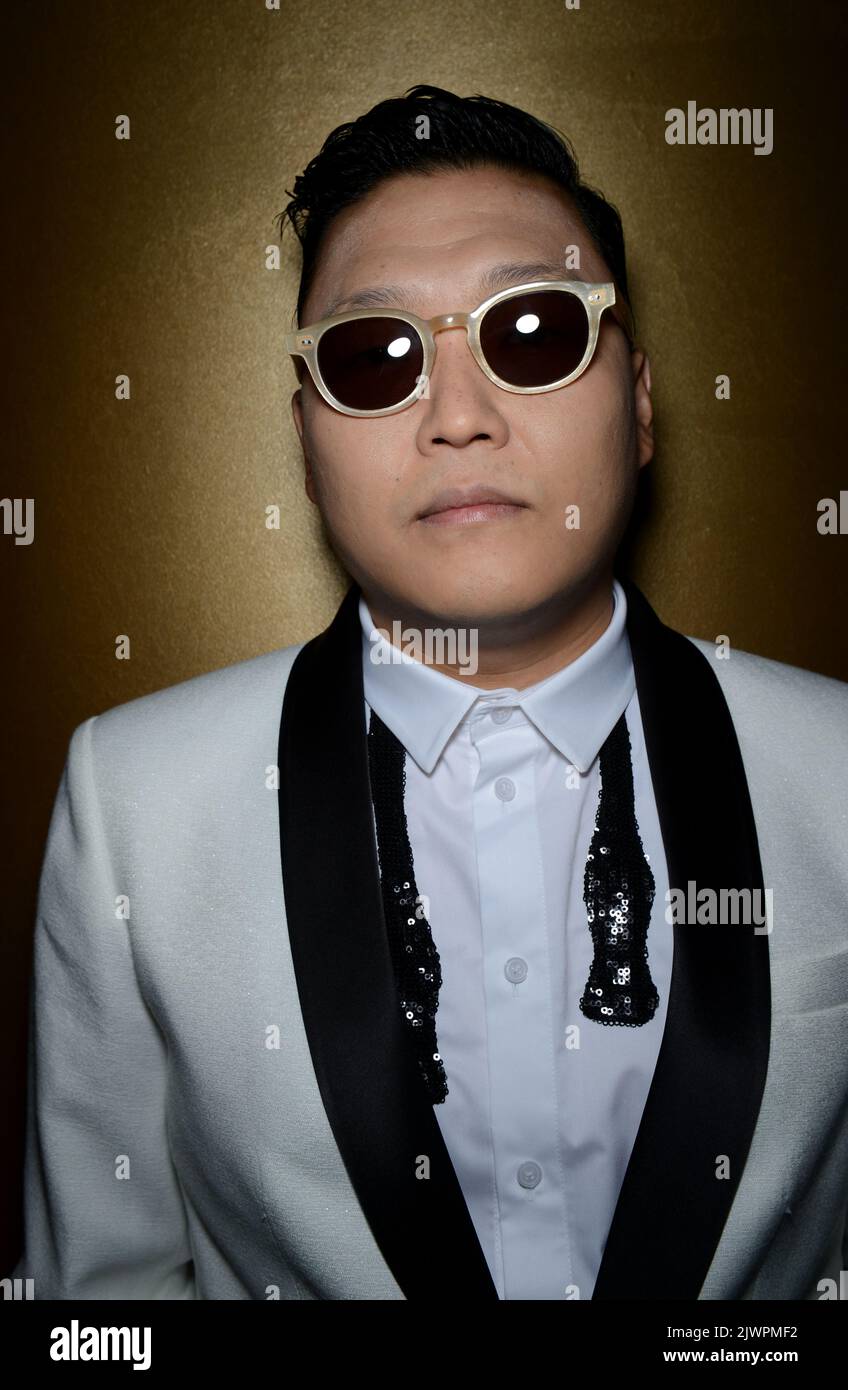 South Korean pop artist Psy, Jae-Sang Park poses for photographs in ...