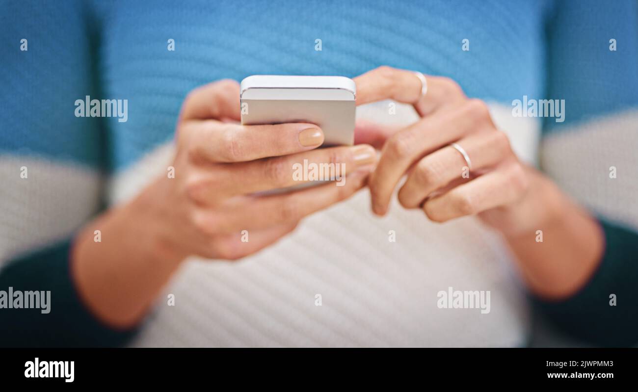 Connect and contact. a woman using a mobile phone Stock Photo - Alamy
