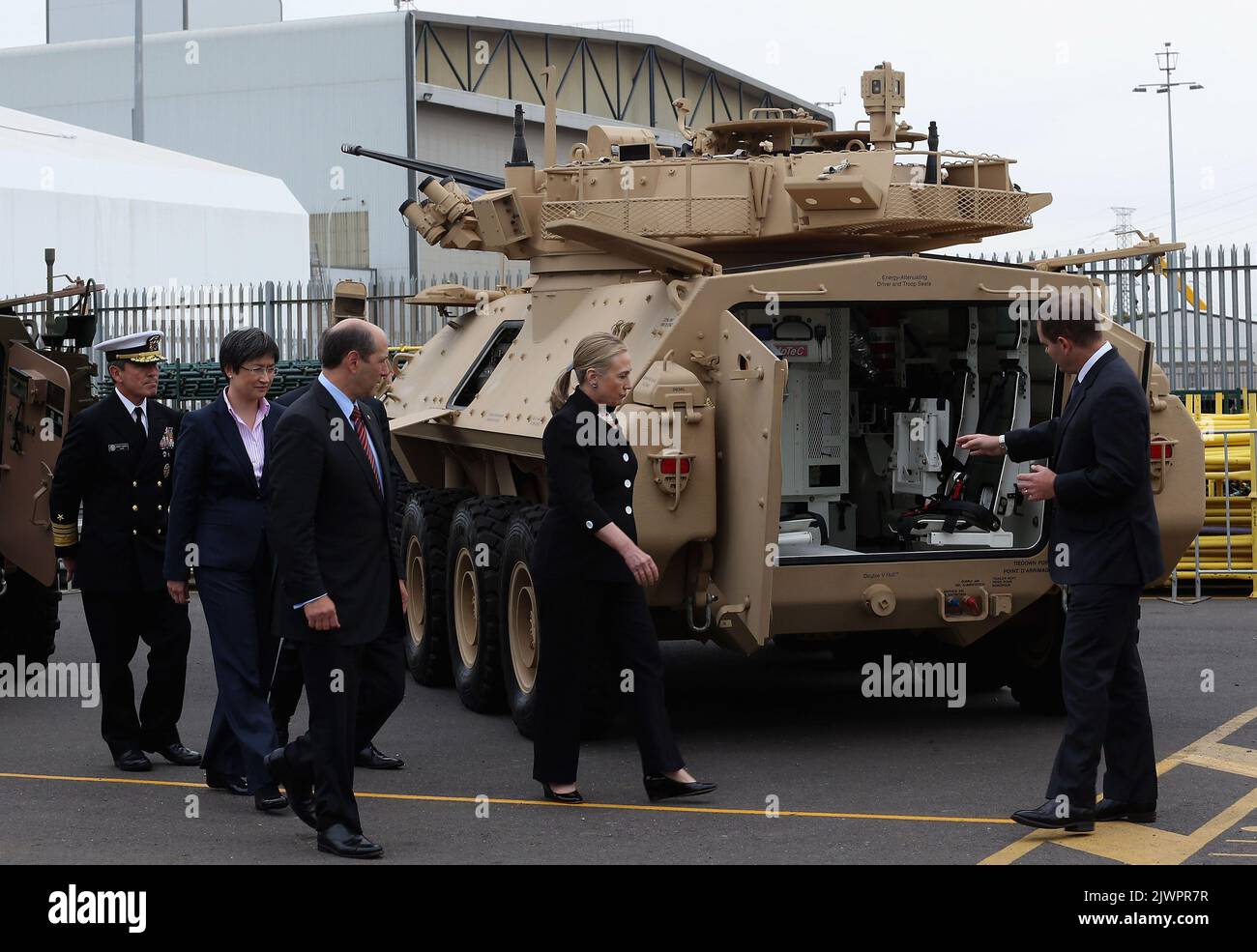 US Secretary of State Hillary Clinton inspects an armoured vehicle ...