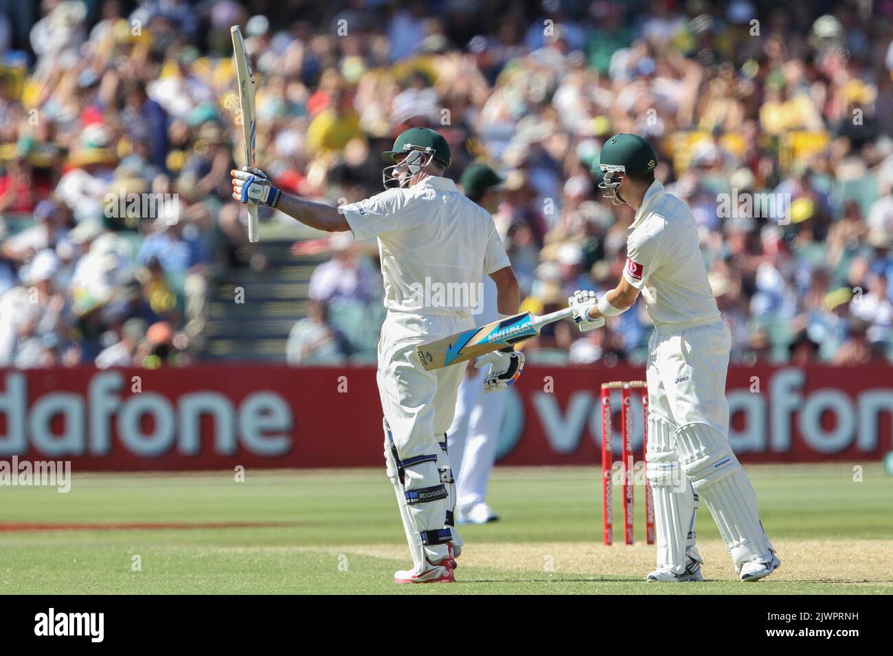 Australia's Michael Hussey celebrates his half century with Michael ...