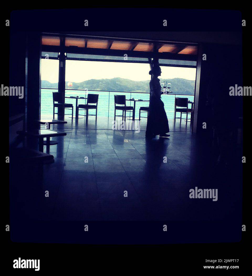Instagram image of a waitress at Qualia resort, Hamilton Island Stock ...