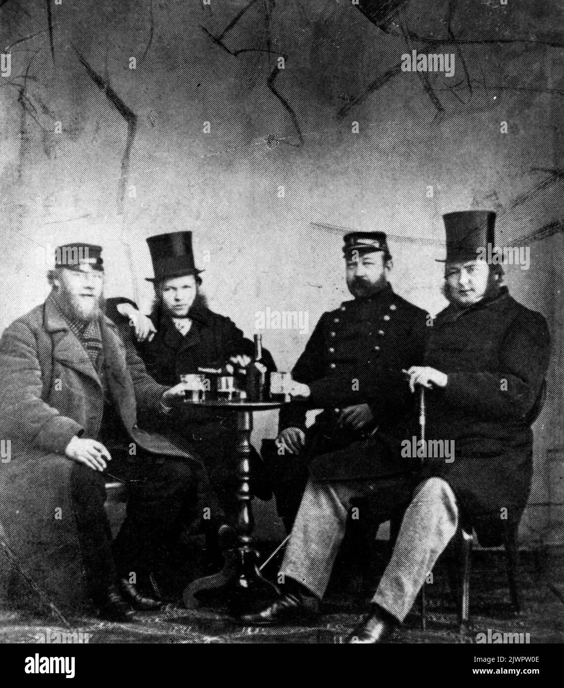 Four gentlemen in the 1860s. The fourth person in the picture can be a ...
