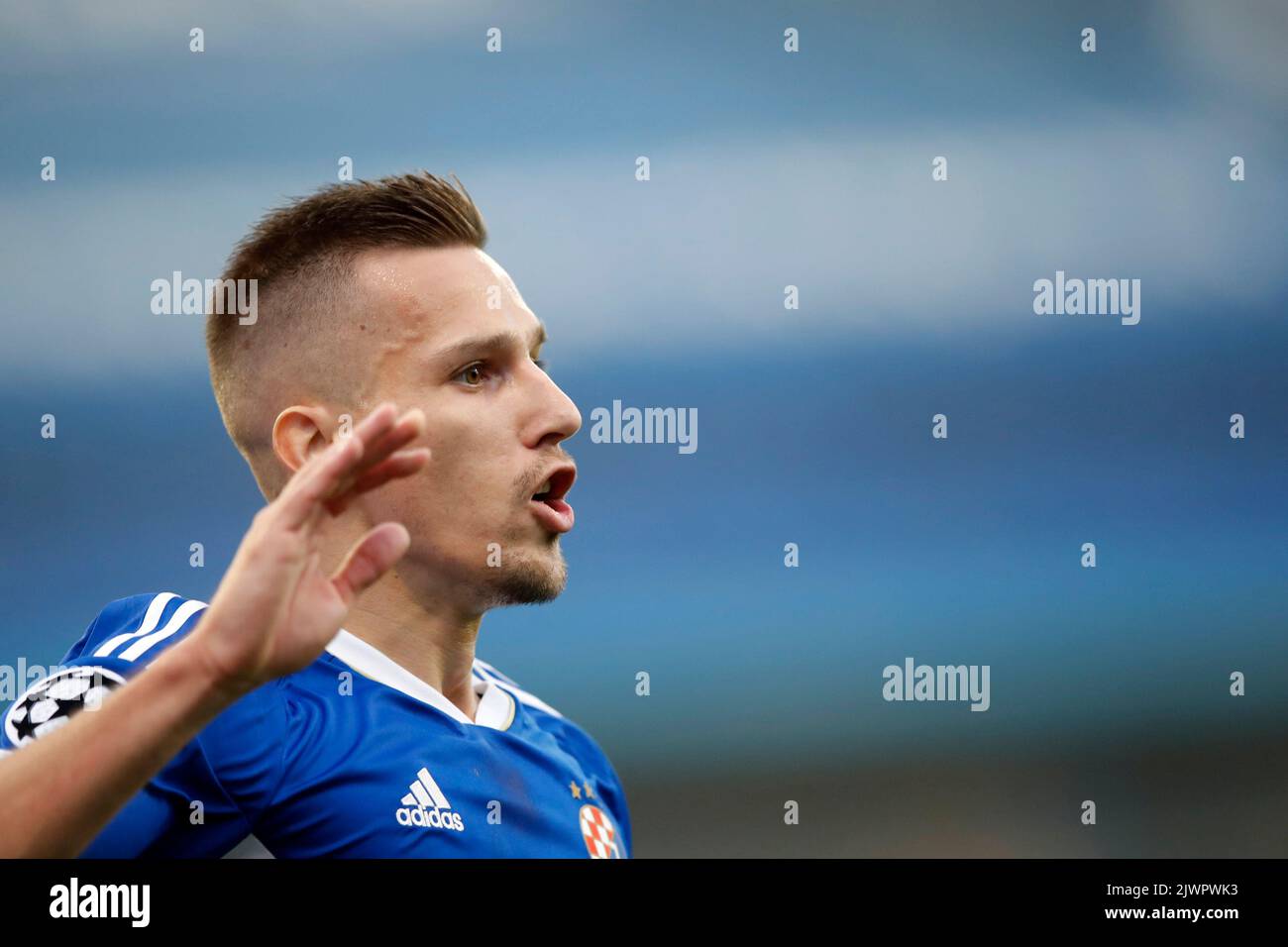 ZAGREB, CROATIA - SEPTEMBER 06: Mislav Orsic of Dinamo Zagreb celebrate ...