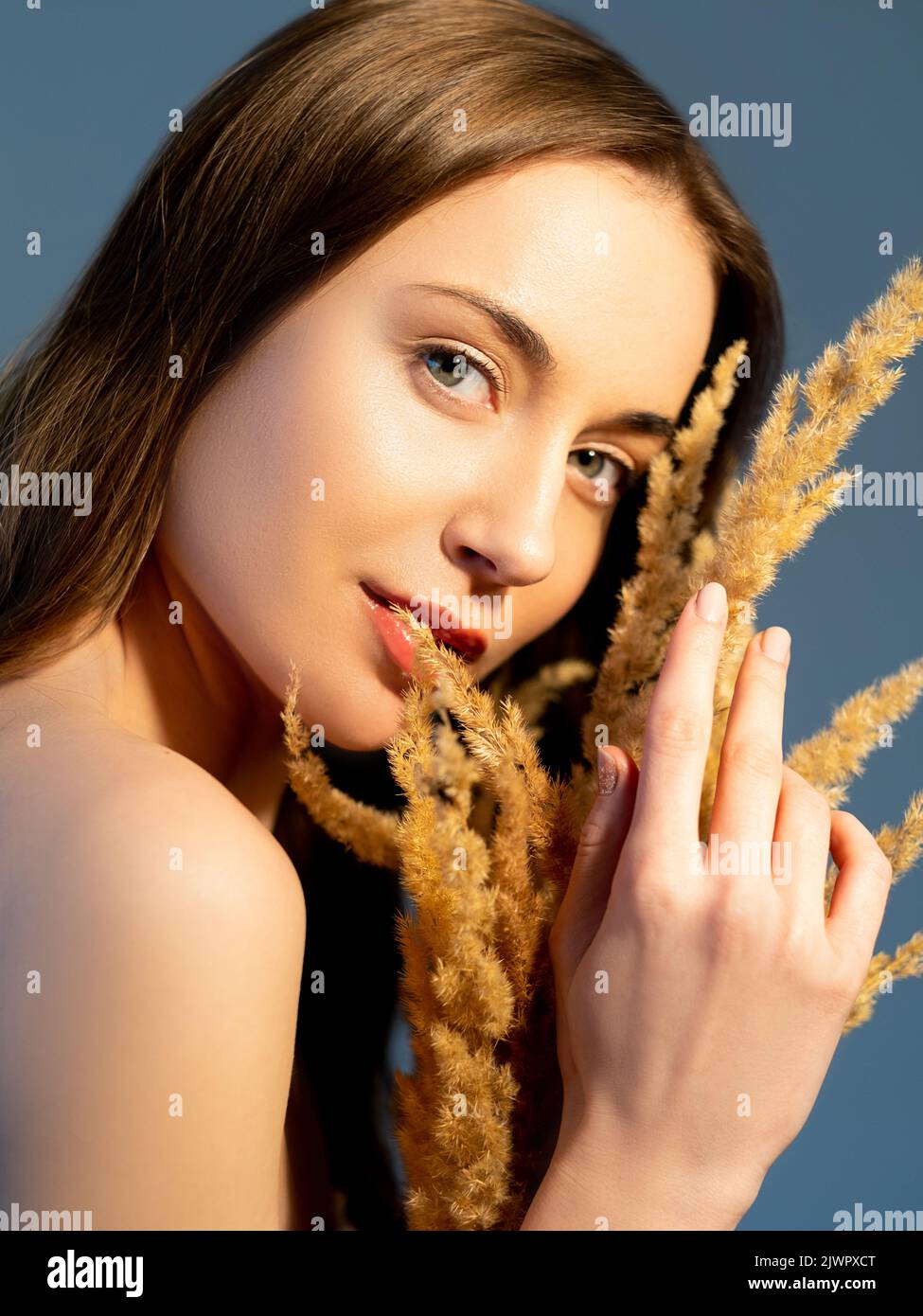woman portrait natural beauty smooth face plant Stock Photo - Alamy