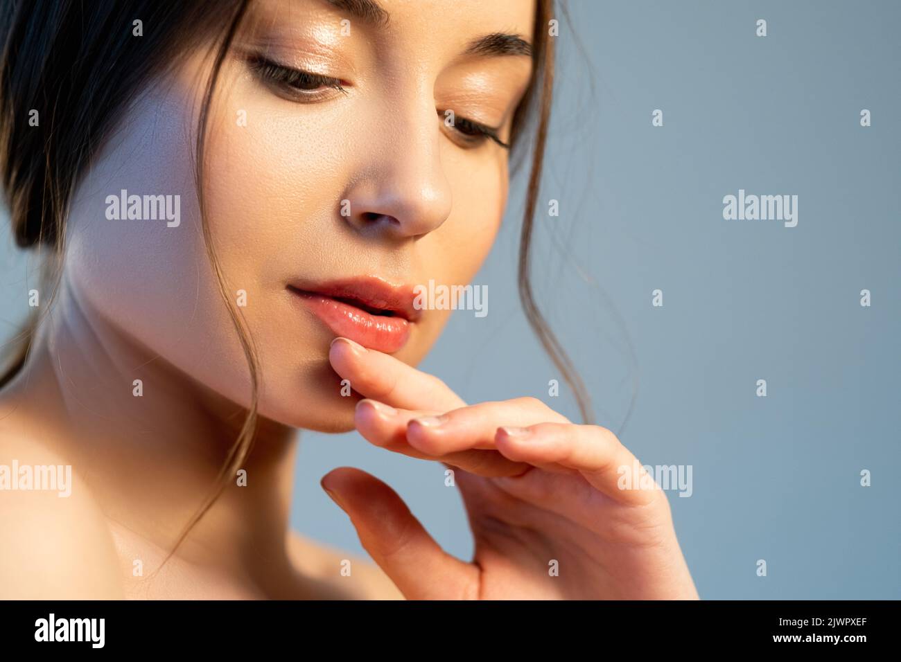 skin moisturizing beauty wellness woman clean face Stock Photo - Alamy