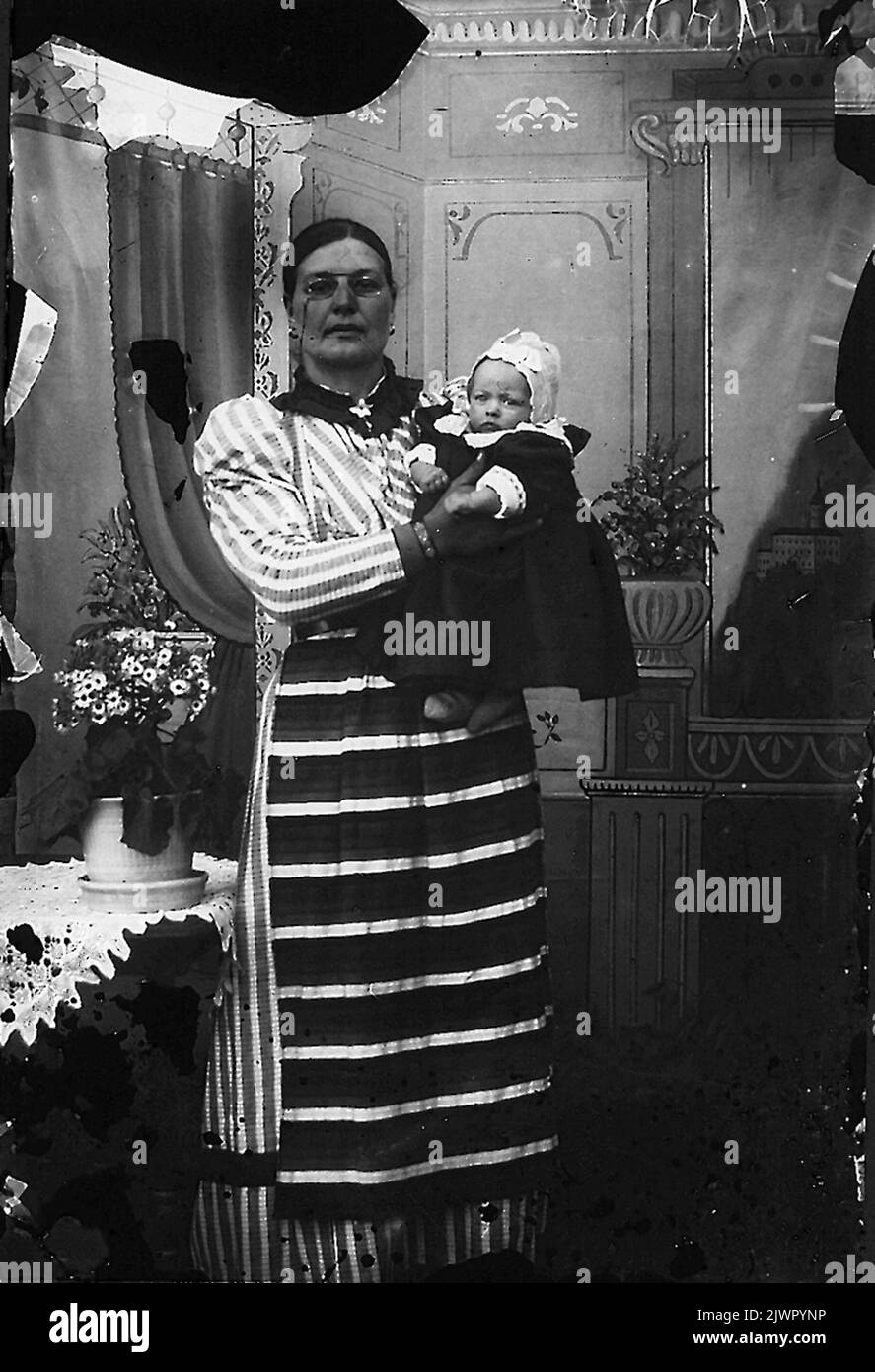 Anna Lindberg, photographer's wife, with unknown child. Anna Lindberg ...