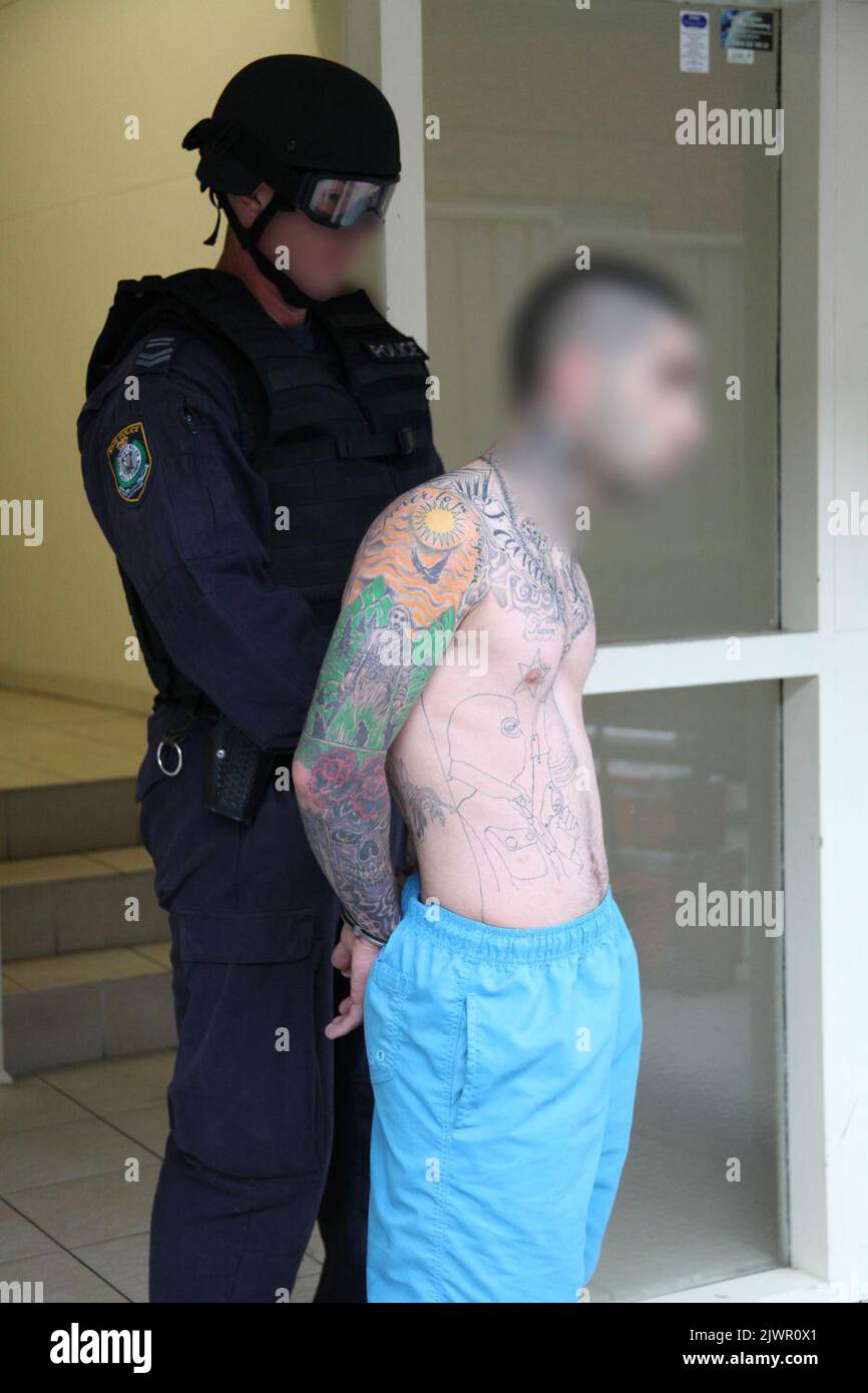 Comanchero member charged with affray Officers from the Gangs Squad ...