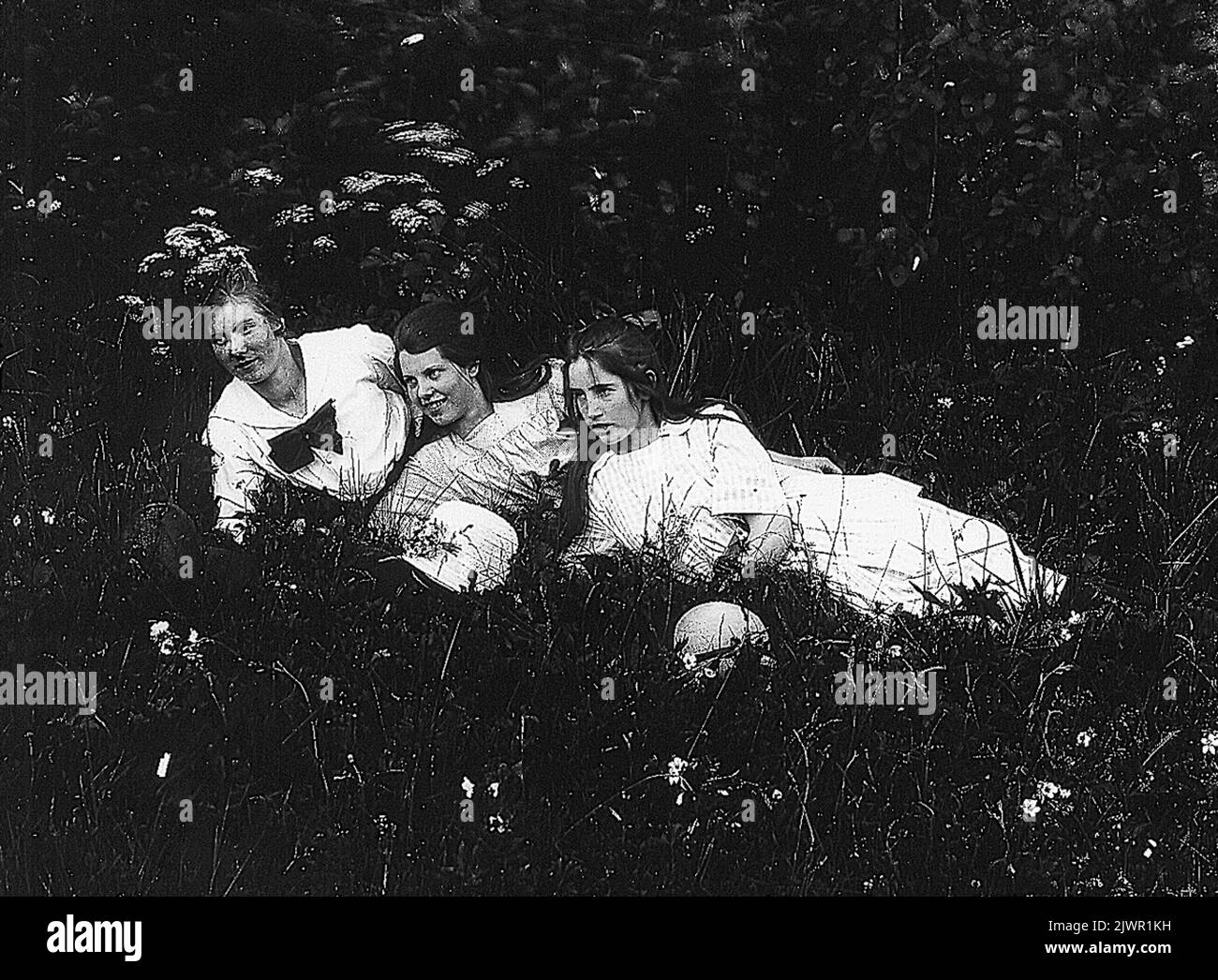 Three unknown people. Tre okända personer Stock Photo - Alamy
