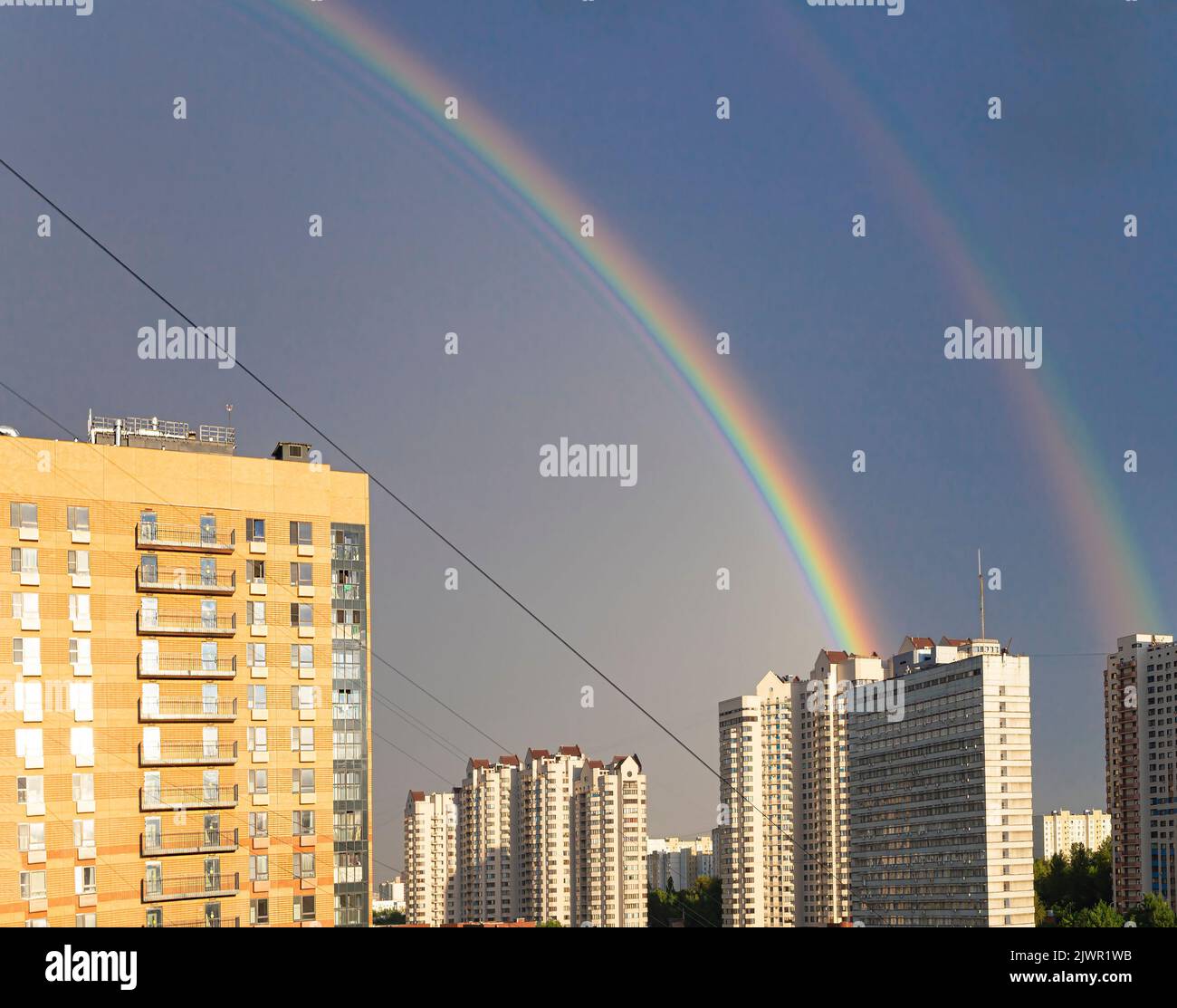 Rainbow after heavy rain (shower) with a thunderstorm and aerial view ...