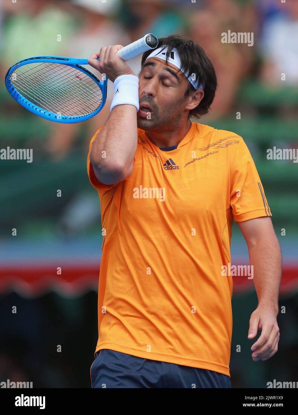 Marcos Baghdatis of Cyprus shows his frustration in the third round ...