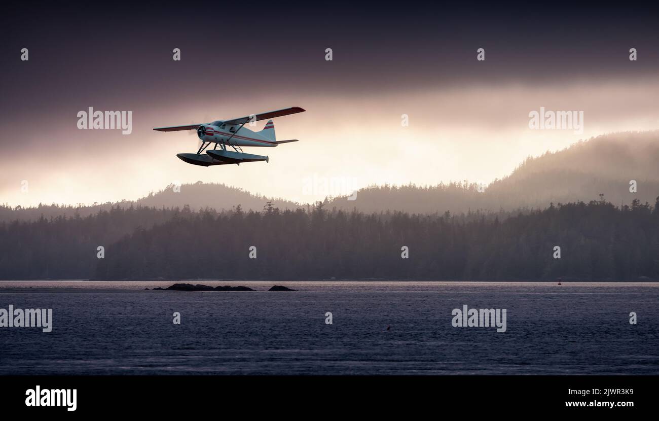 Seaplane Flying over the West Coast Pacific Ocean. Adventure Composite ...