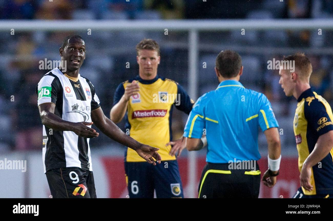 Emile Heskey of Newcastle Jets FC arguing with the referee during the A ...
