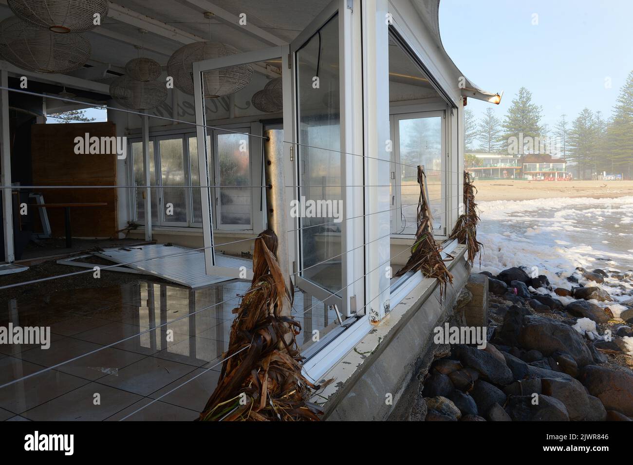 Damage to a beachfront restaurant building is seen courtesy of ex ...