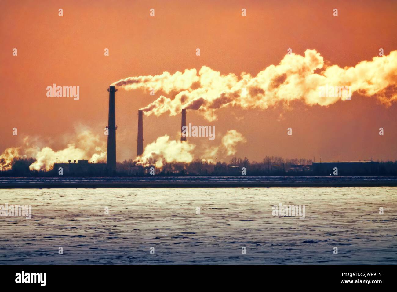 Immission. Smoky pipes and poisoned atmosphere and water of the ...