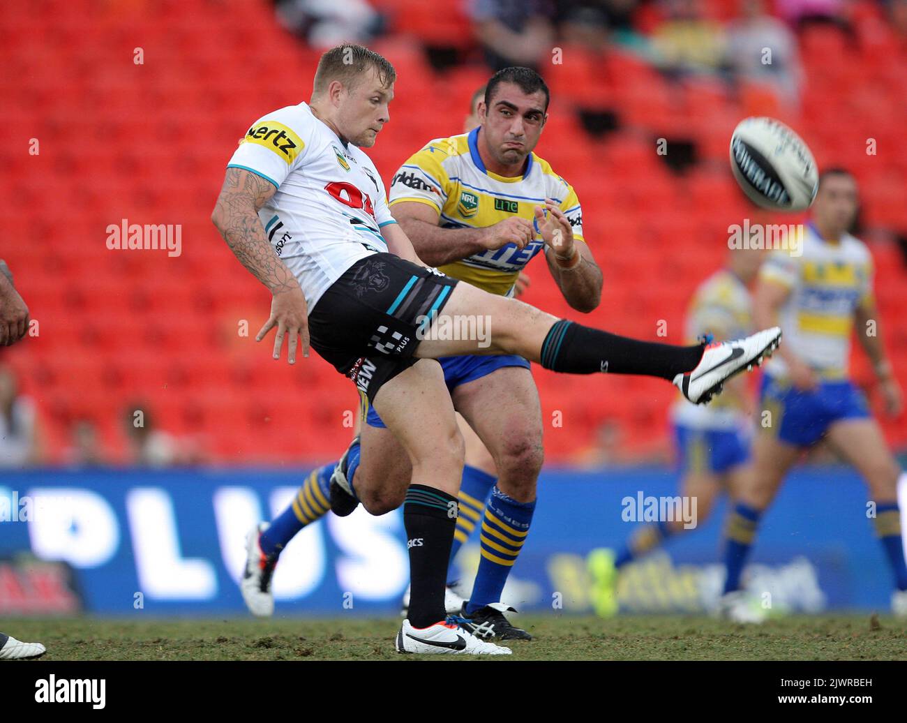 Blake Austin kicks during the Rugby League trial match between Penrith ...