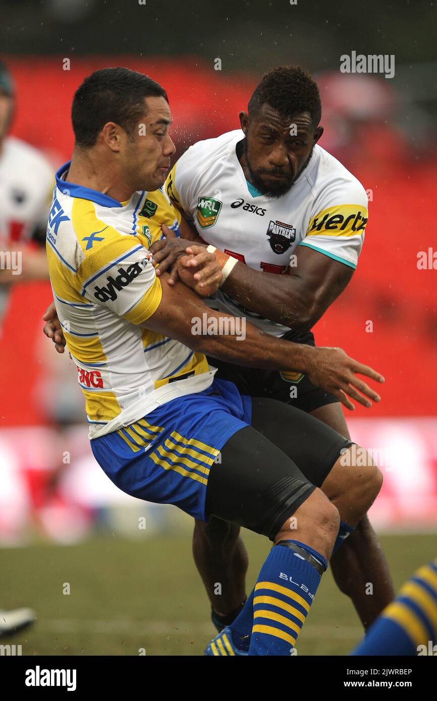 Wes Naiqama hits Jarryd Hayne during the Rugby League trial match ...