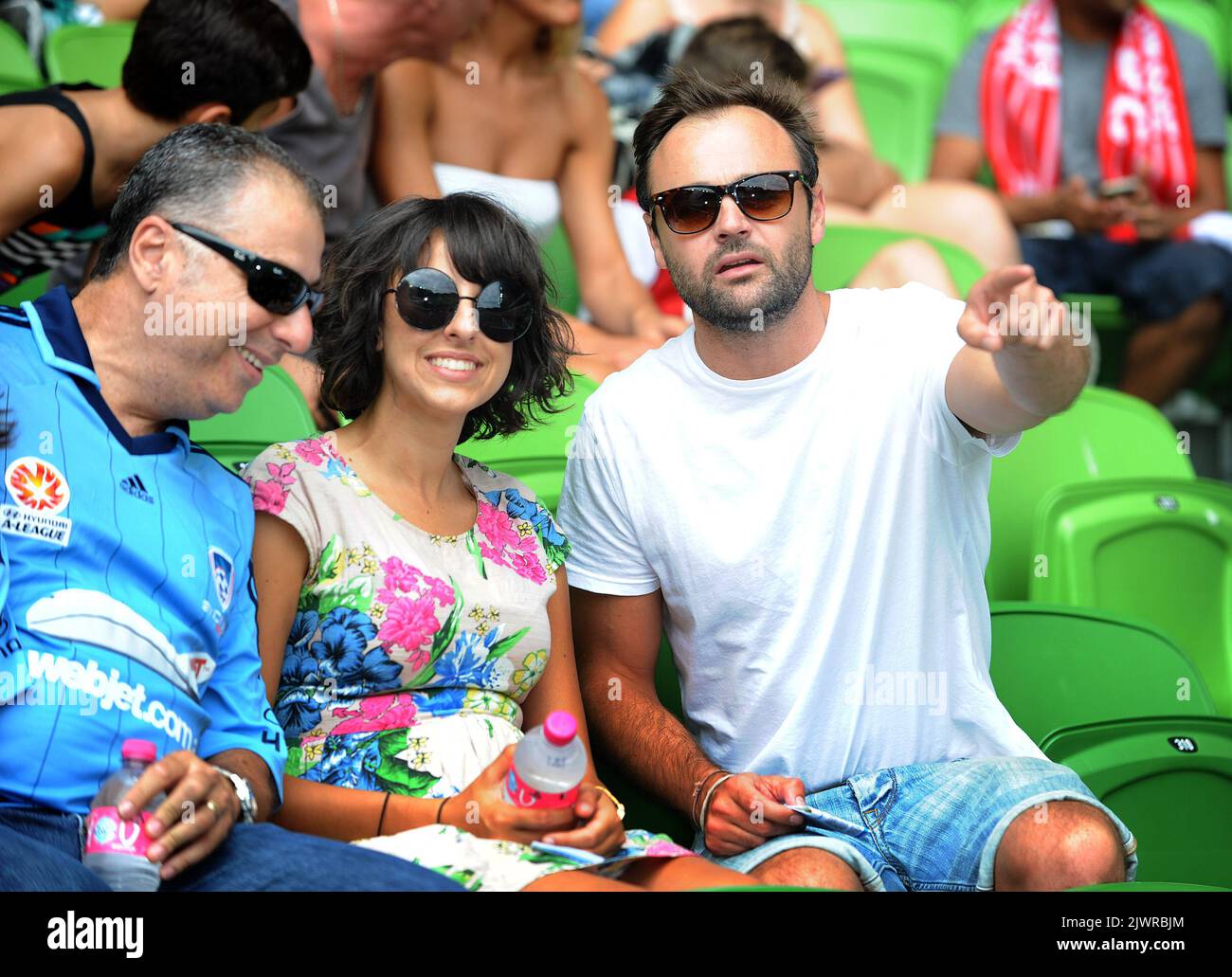 Australian actor Gyton Grantley (right)and his friends watch the action ...