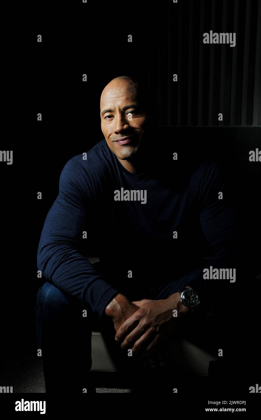 American actor Dwayne Johnson poses for photographs in Sydney, Thursday ...