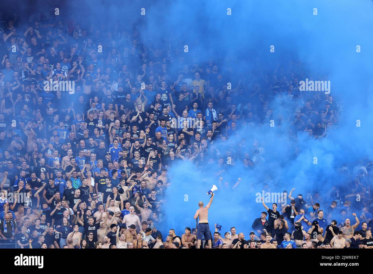 ZAGREB, CROATIA - SEPTEMBER 06: Fans lit flares in the stands during ...