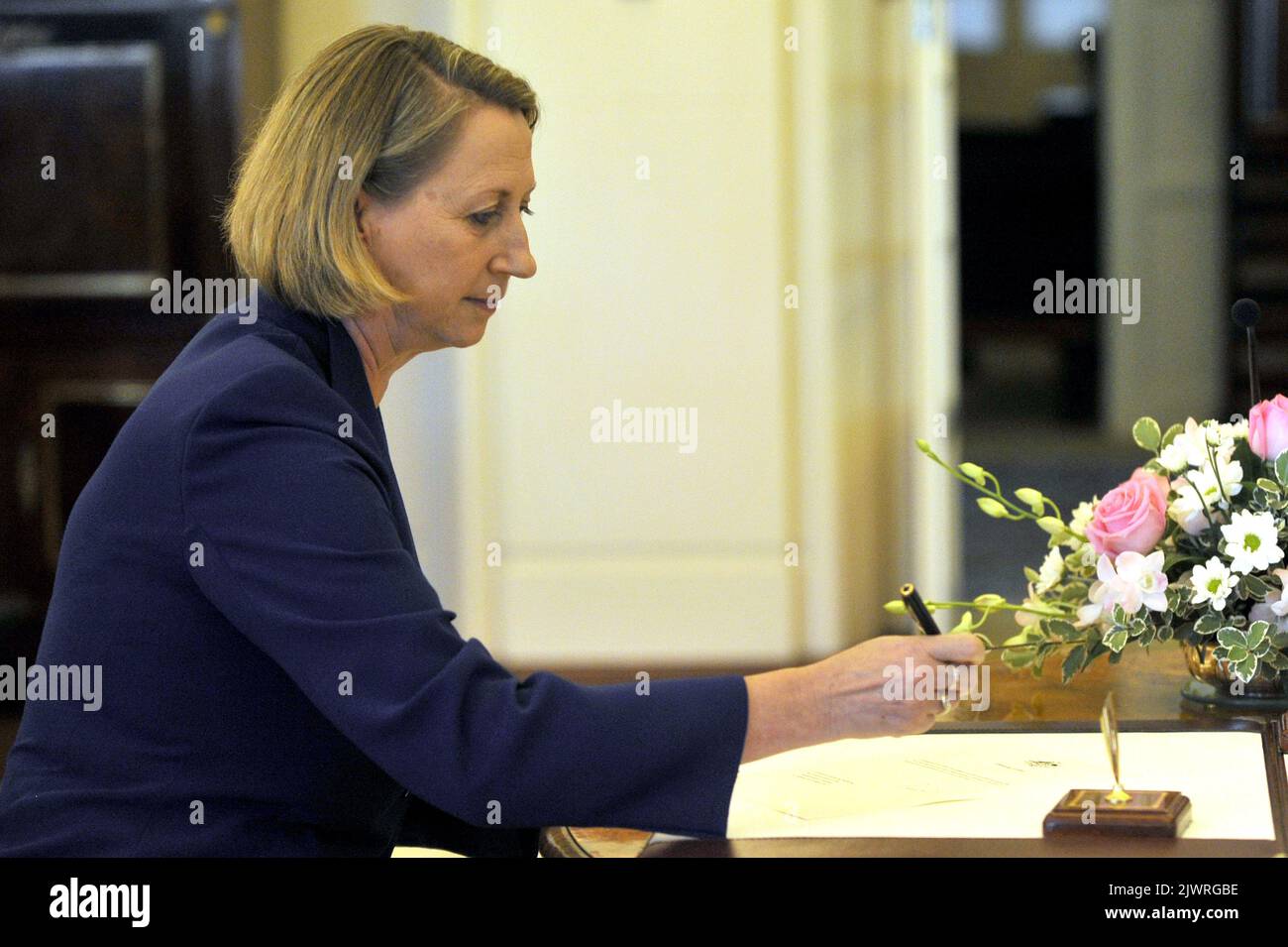 Sharon Bird signs her commission as minister for Higehr Education at ...